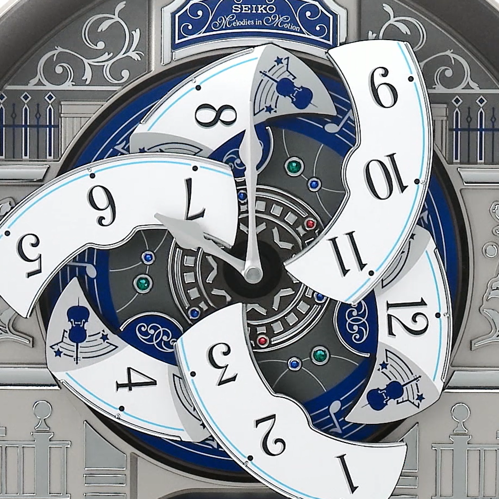 Seiko Melodies in Motion Metallic Silver Rotating Pendulum Wall Clock ...